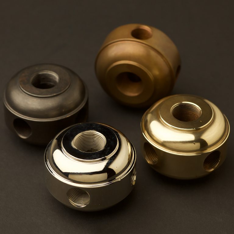 Solid turned brass four way coupler