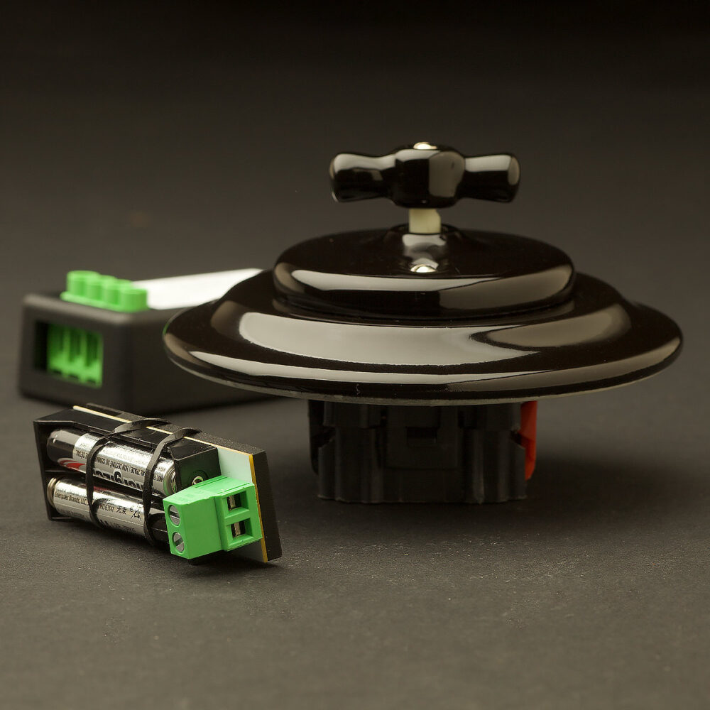 Black Porcelain single turn light switch with mount plate